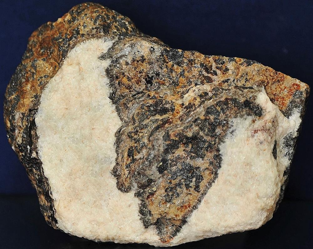 FOMS - White willemite crystals in dolomite, franklinite and garnet from Franklin, NJ